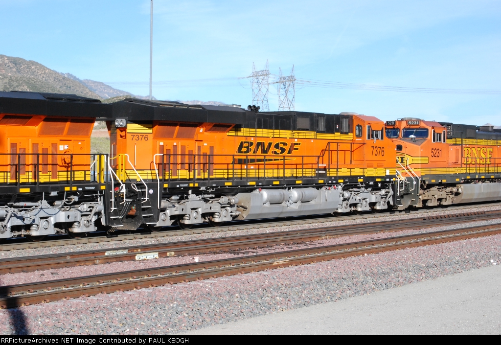 BNSF 7376 flies by me as she heads towards BNSF Barstow with BNSF 7803 as the lead unit.